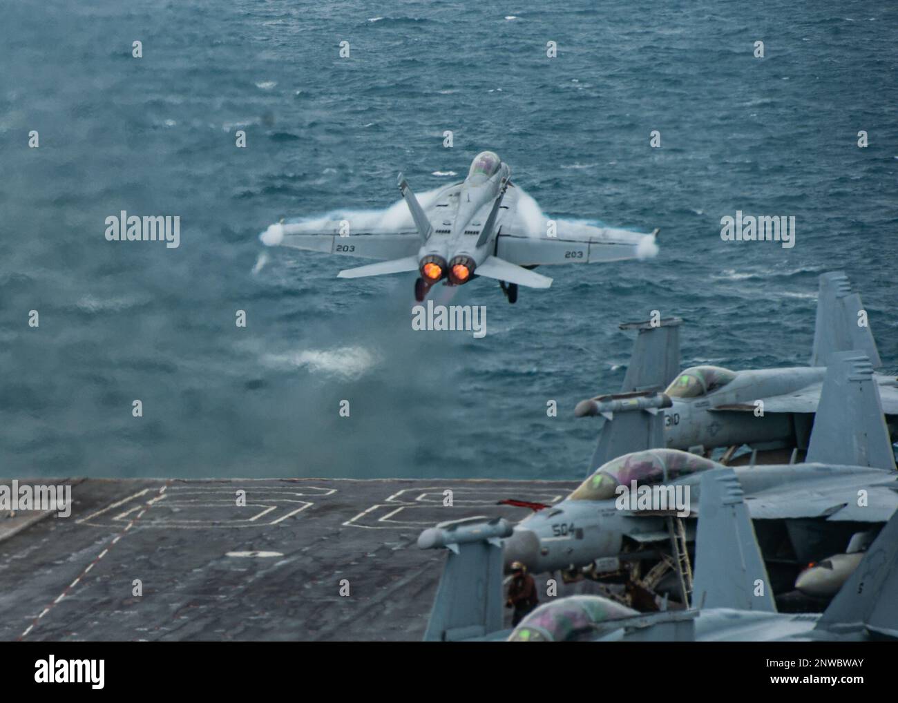 230127-N-MH015-1256 SOUTH CHINA SEA (Jan. 27, 2023) An F/A-18F Super Hornet from the “Mighty ...