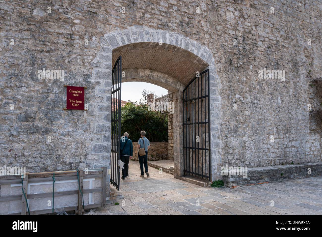 The Iron Gate in the fortified stone walls of the Old Town of Budva ...