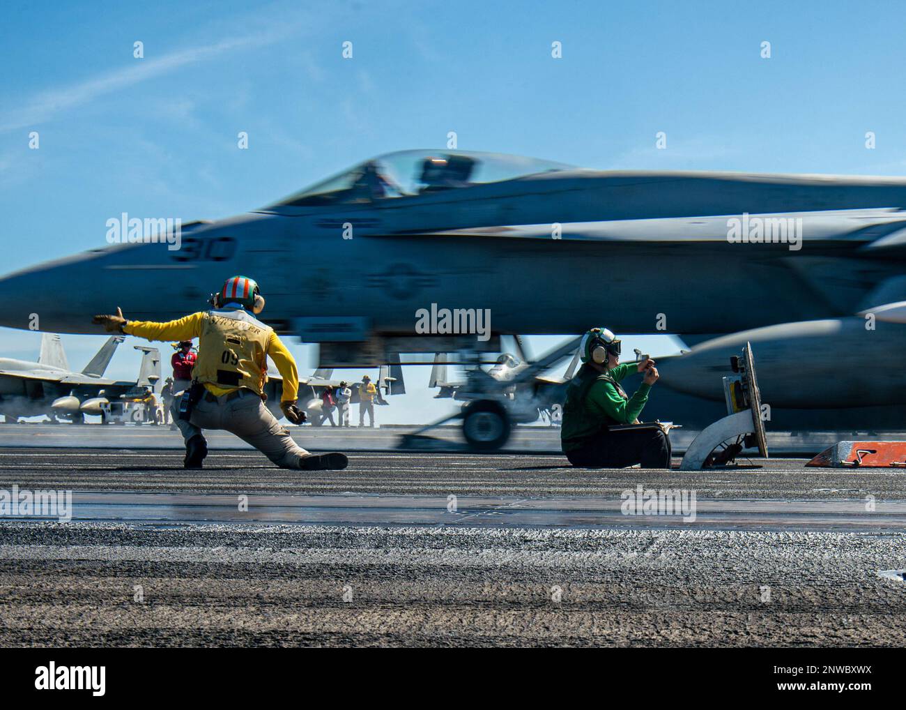 230113-N-MH015-1126 SOUTH CHINA SEA (Jan. 13, 2023) An F/A-18E Super Hornet from the “Kestrels ...