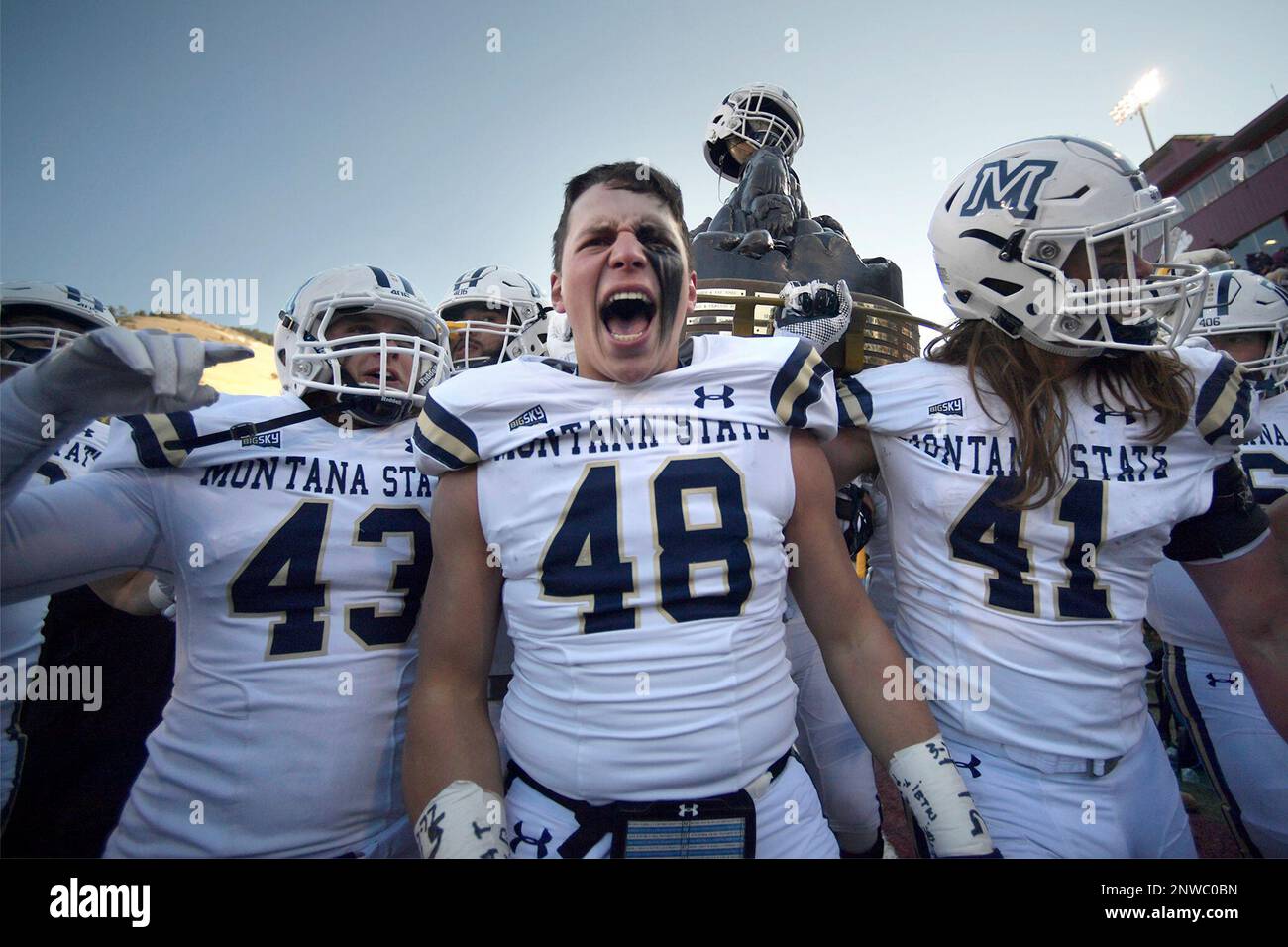Montana State tight end Ryan Davis, center, celebrates with the team ...