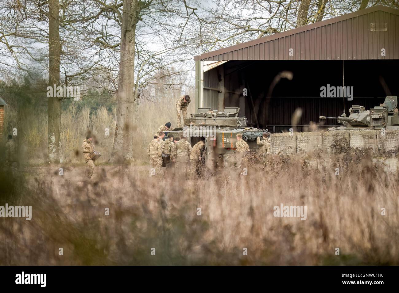 a British army Warrior FV510 fighting vehicle loading infantry ready ...