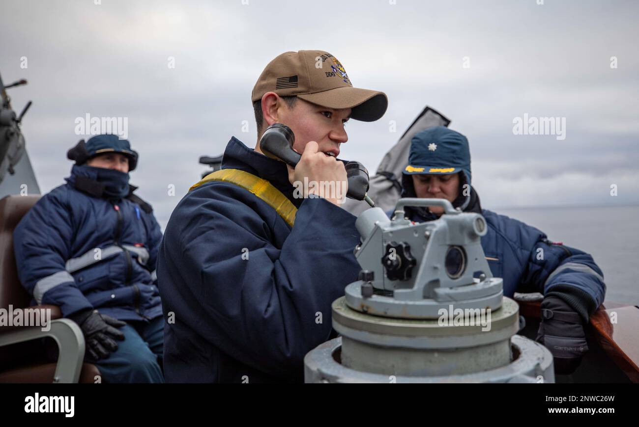 BALTIC SEA (Jan. 23, 2023) Ensign Corey Shideler, middle, communicates ...