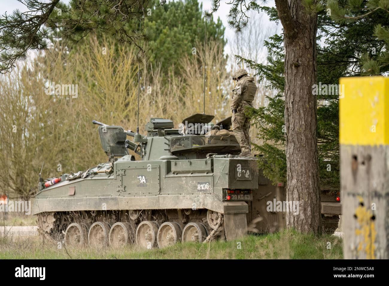 soldier stands atop a British army Warrior FV510 fighting vehicle Stock ...