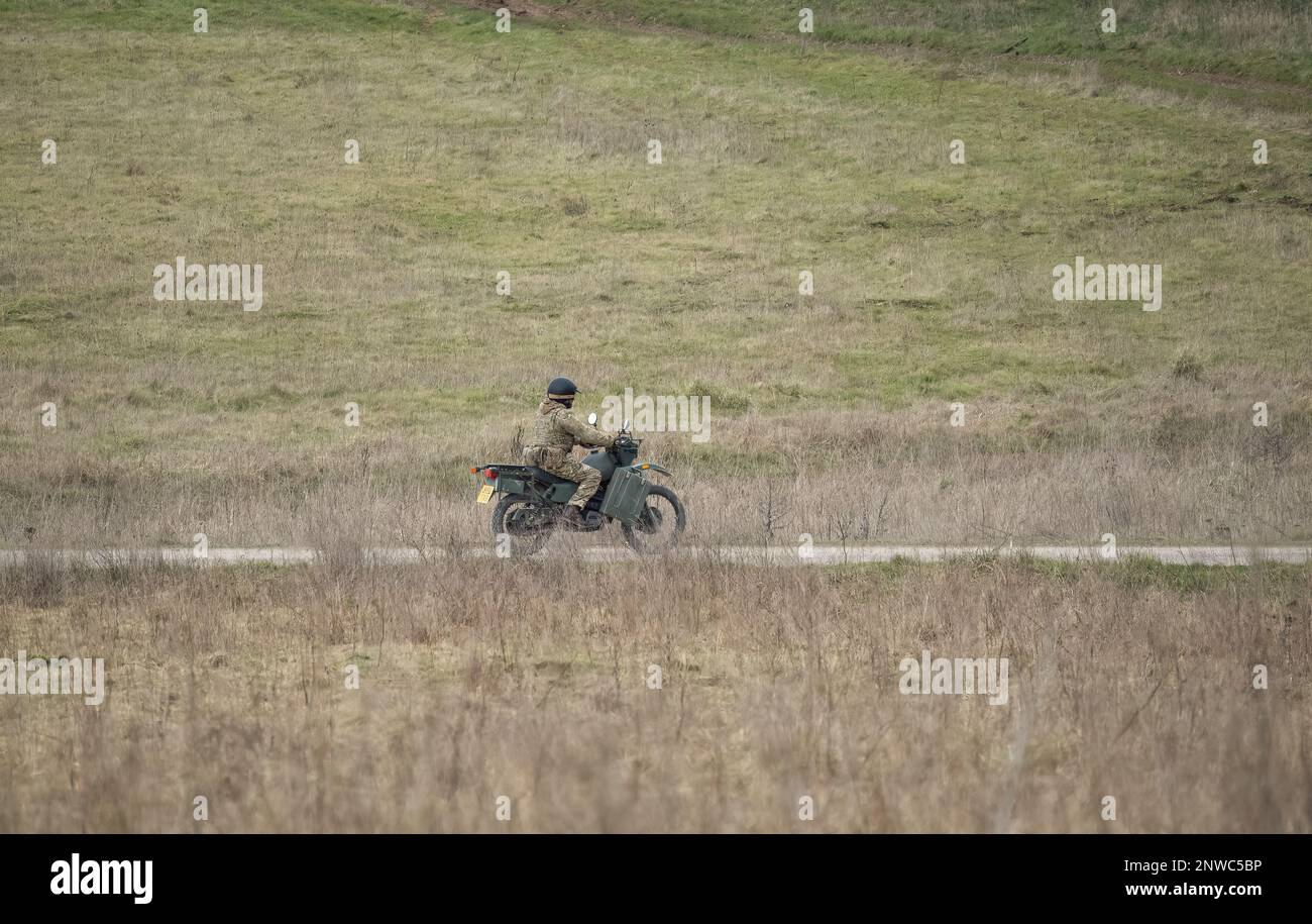 army dispatch motor cycle rider in action Stock Photo - Alamy