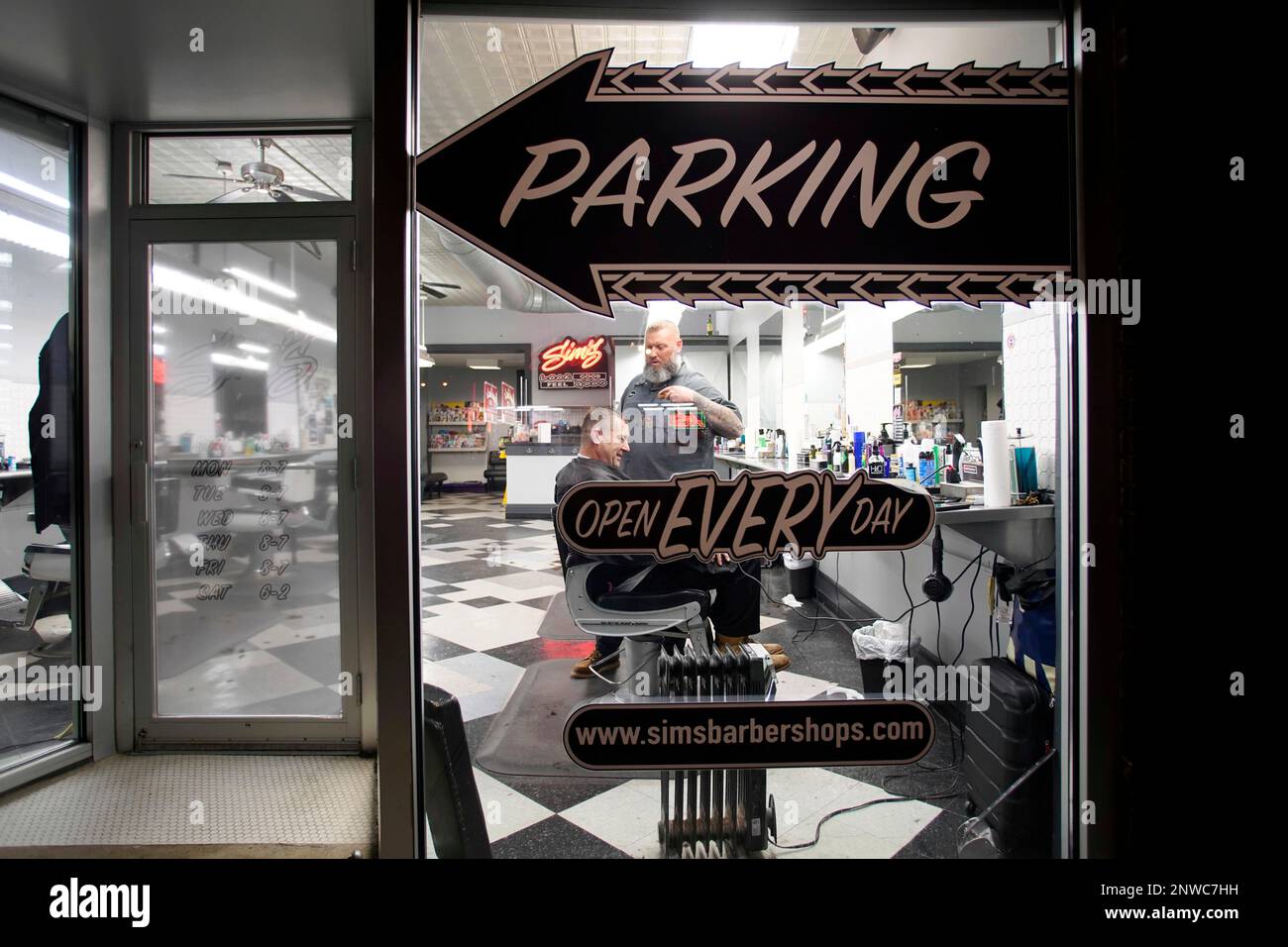 In this Nov. 13, 2018, photo, Steve Vilot gives a late night haircut to ...