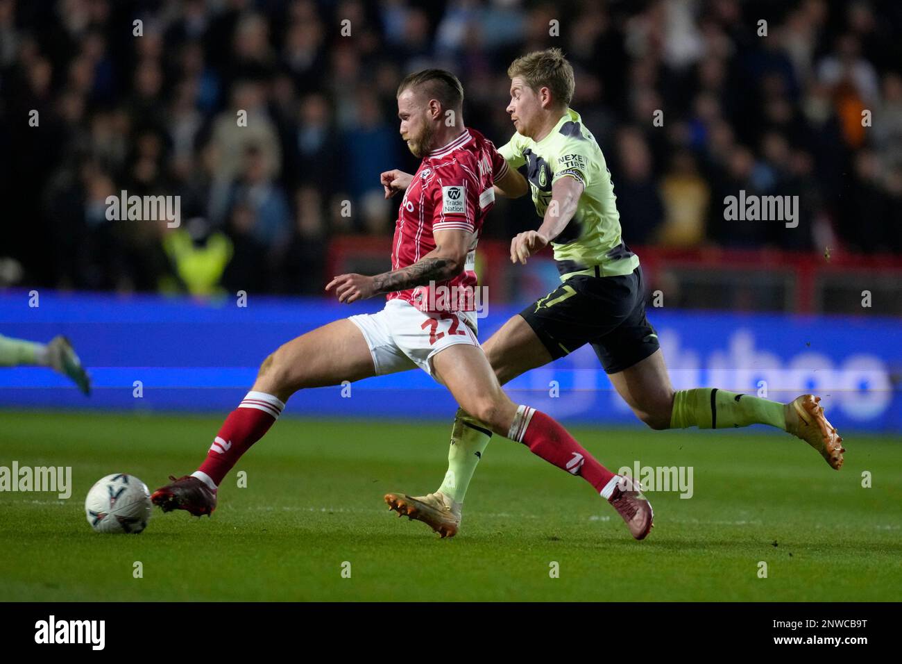 Bristol City's Tomas Kalas, left, challenges for the ball with ...