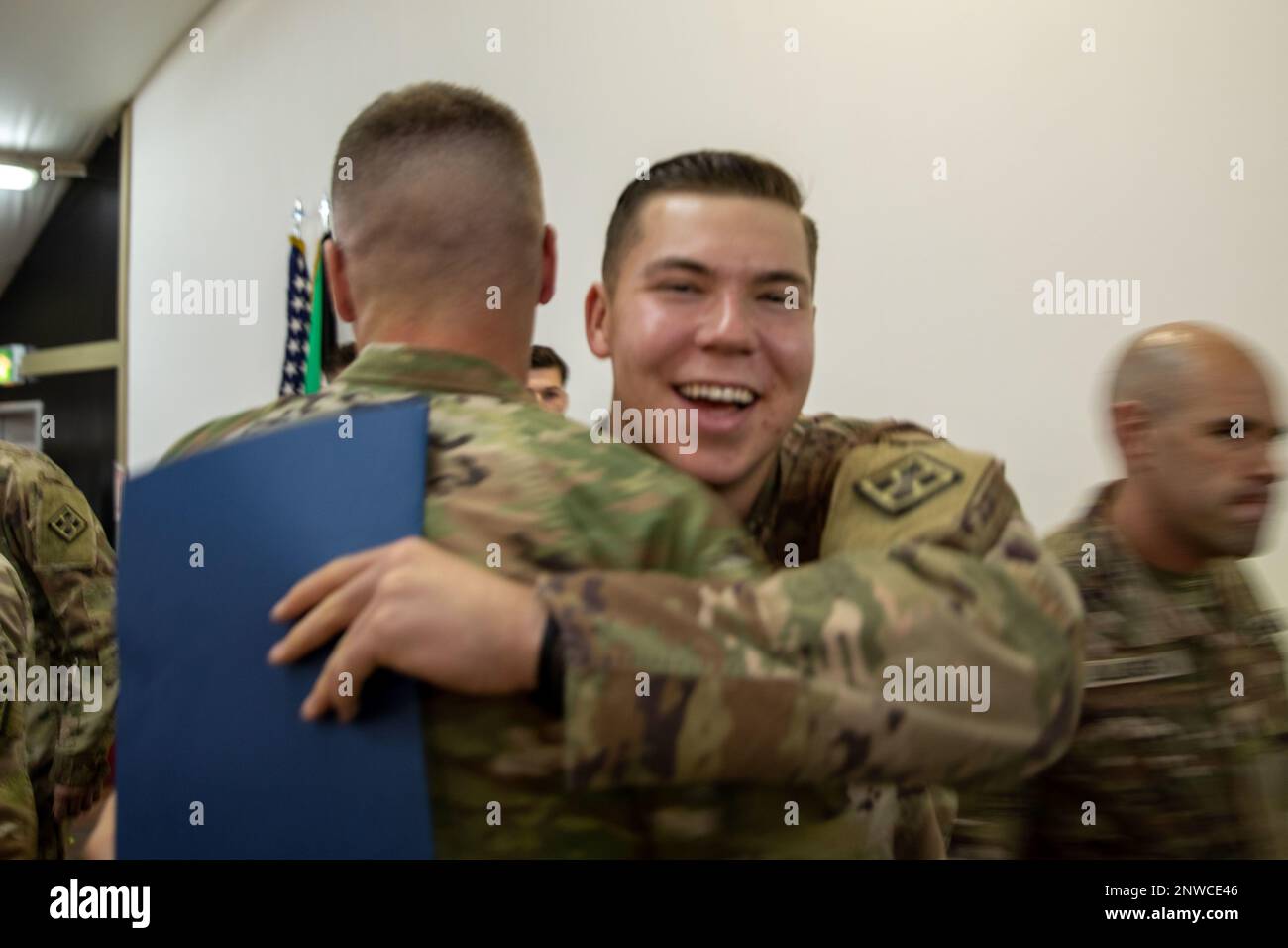 U.S. Army Sgt. Trenton Word hugs a Soldier after a Basic Leader Course ...