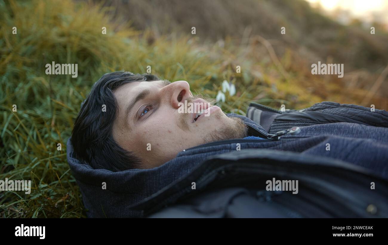 Handsome Young Man Taking a Deep Breath and Resting Amidst the ...