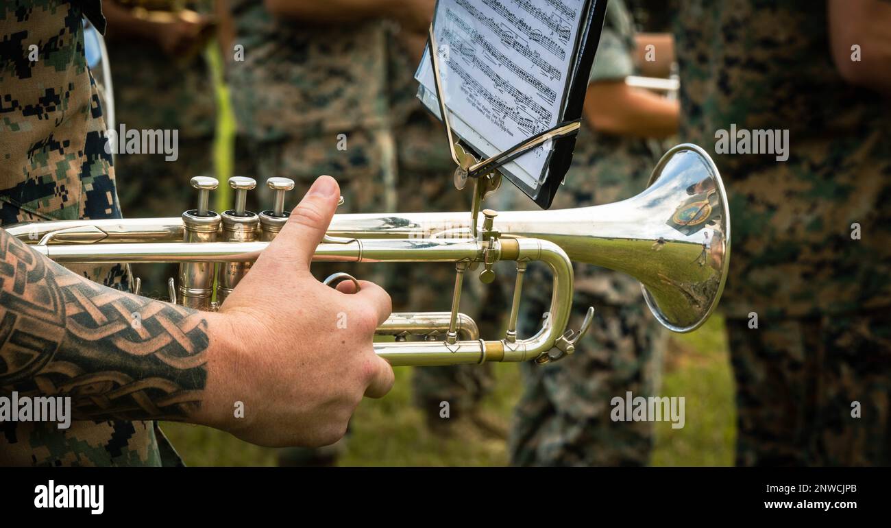 A U.S. Marine with Marine Forces Pacific Band prepares to play the ...