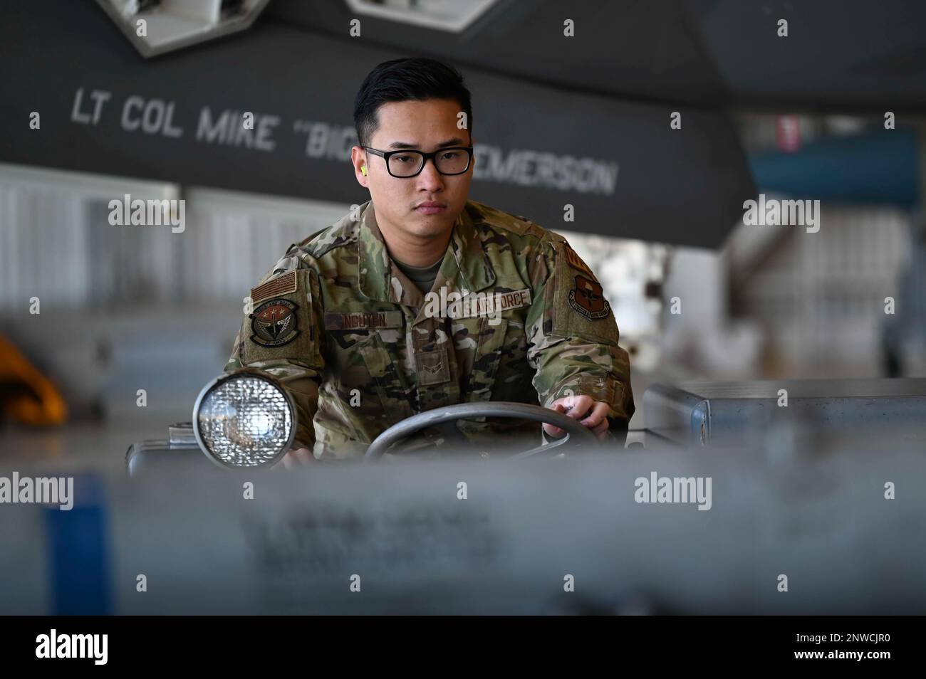 U.S. Air Force Airman 1st Class Dat Nguyen, a weapons load crew chief ...