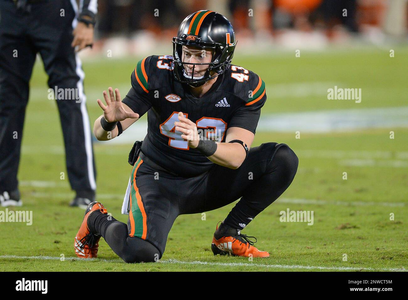 ATLANTA, GA – NOVEMBER 10: Miami's Jack Spicer (43) waits on the snap ...