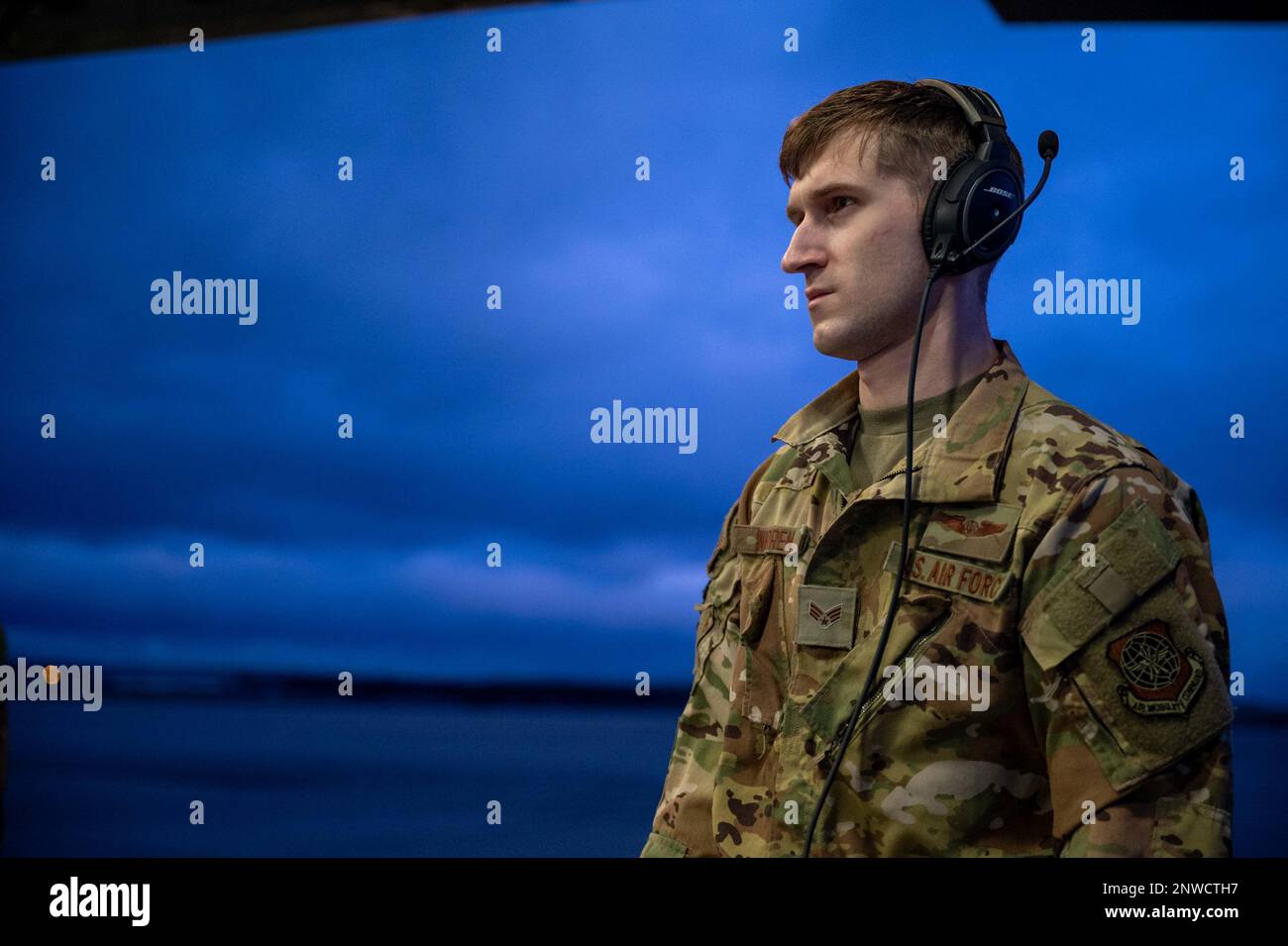 Senior Airman Matthew Warren, 3rd Airlift Squadron loadmaster, prepares ...