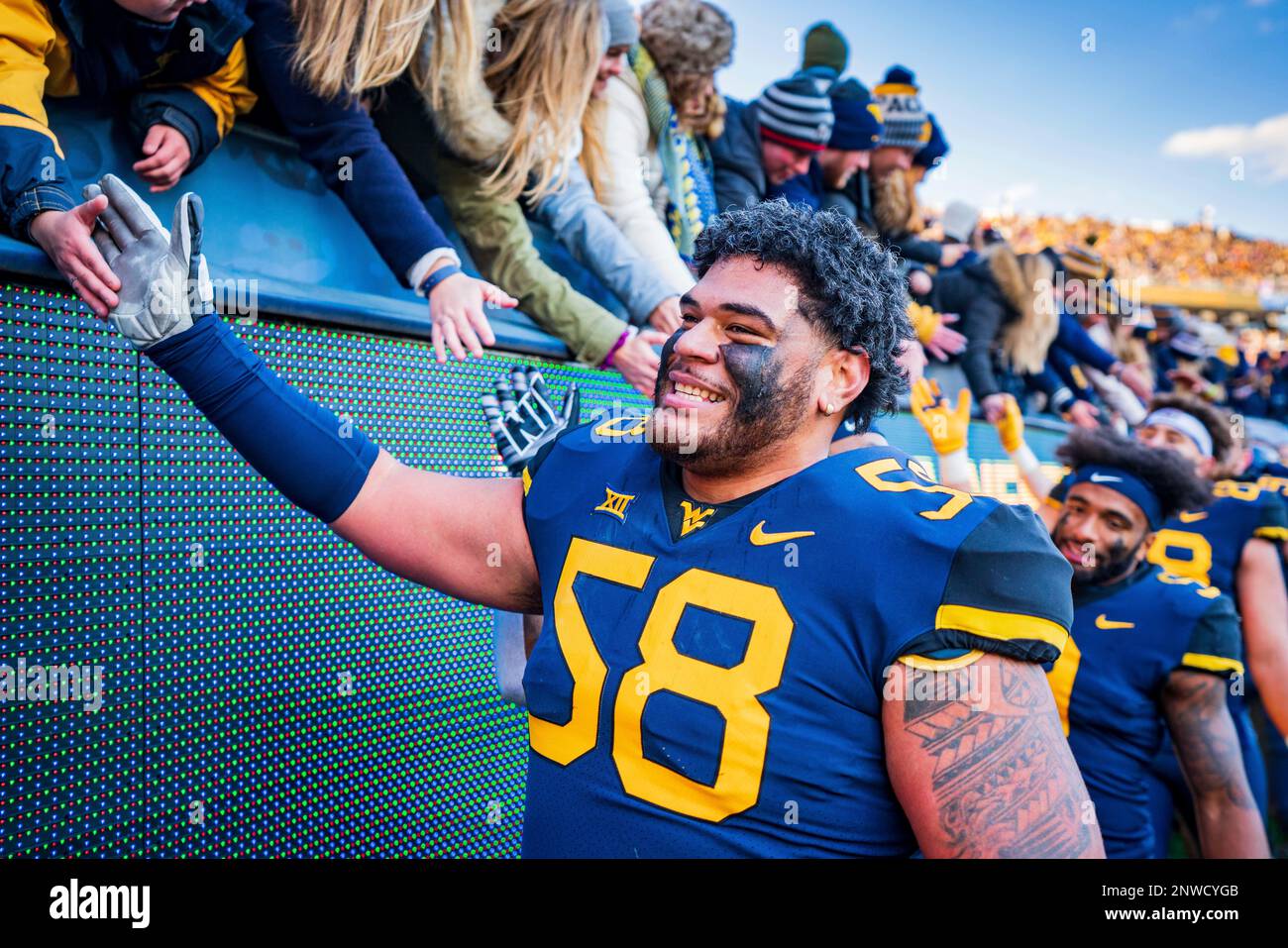 West Virginia Mountaineers offensive lineman Joe Brown (58) after the ...