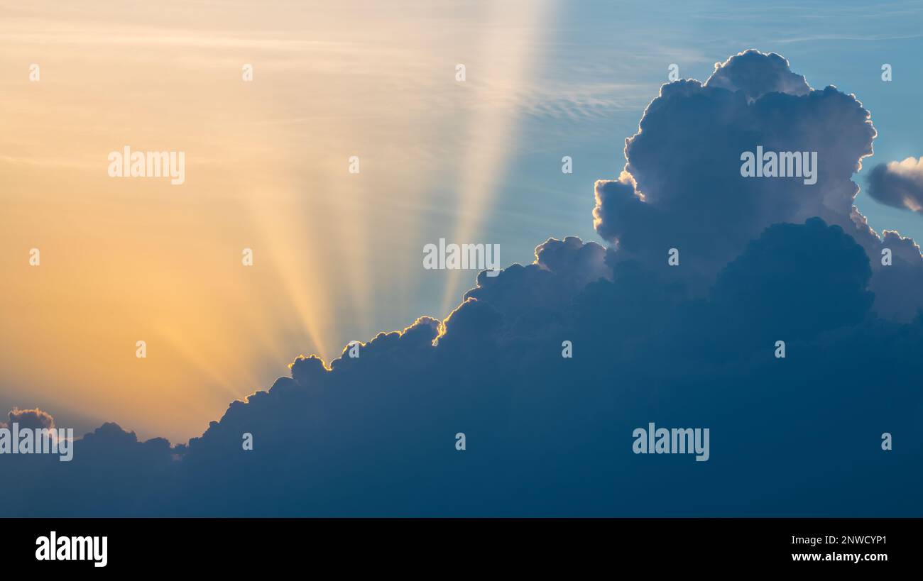 Sunbeam cloud ray sunset beam hi-res stock photography and images - Alamy