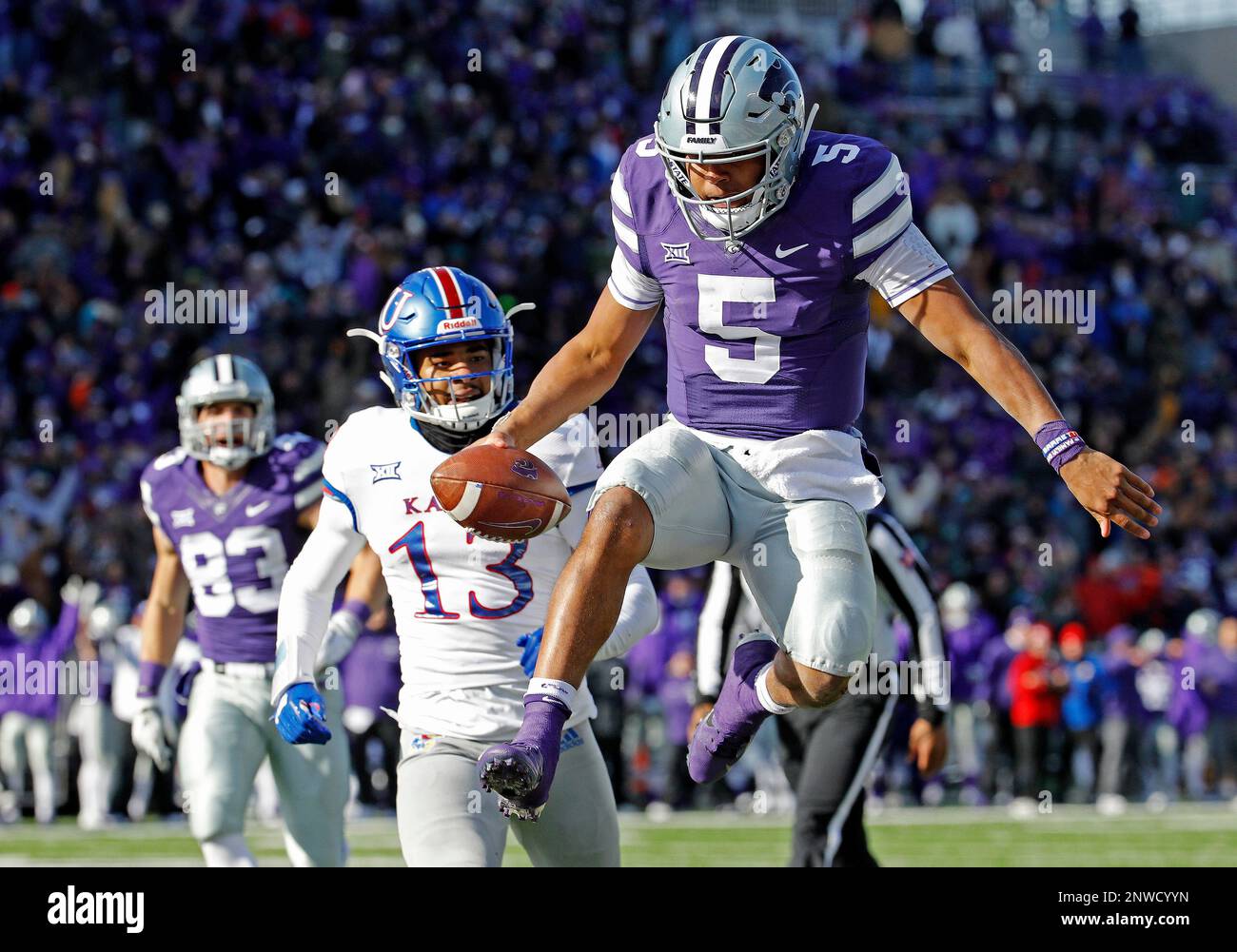 Kansas State quarterback Alex Delton (5) gets past Kansas cornerback ...
