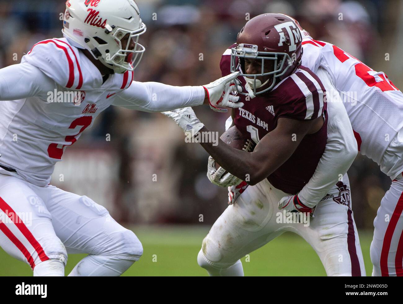 Texas A&M wide receiver Quartney Davis (1) is tackled by Ole Miss ...