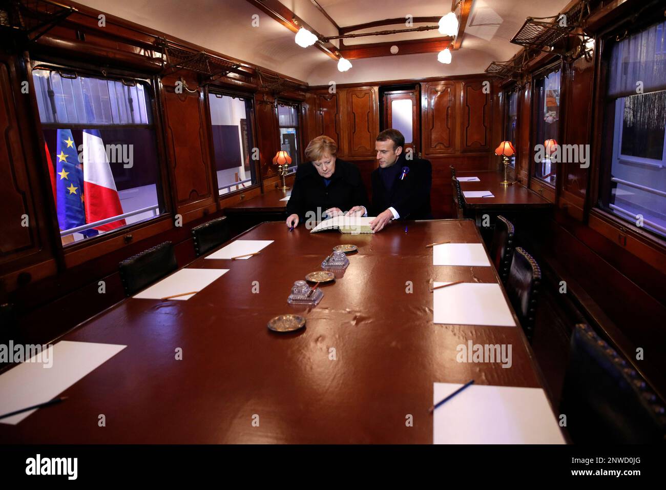 French President Emmanuel Macron and German Chancellor Angela Merkel ...