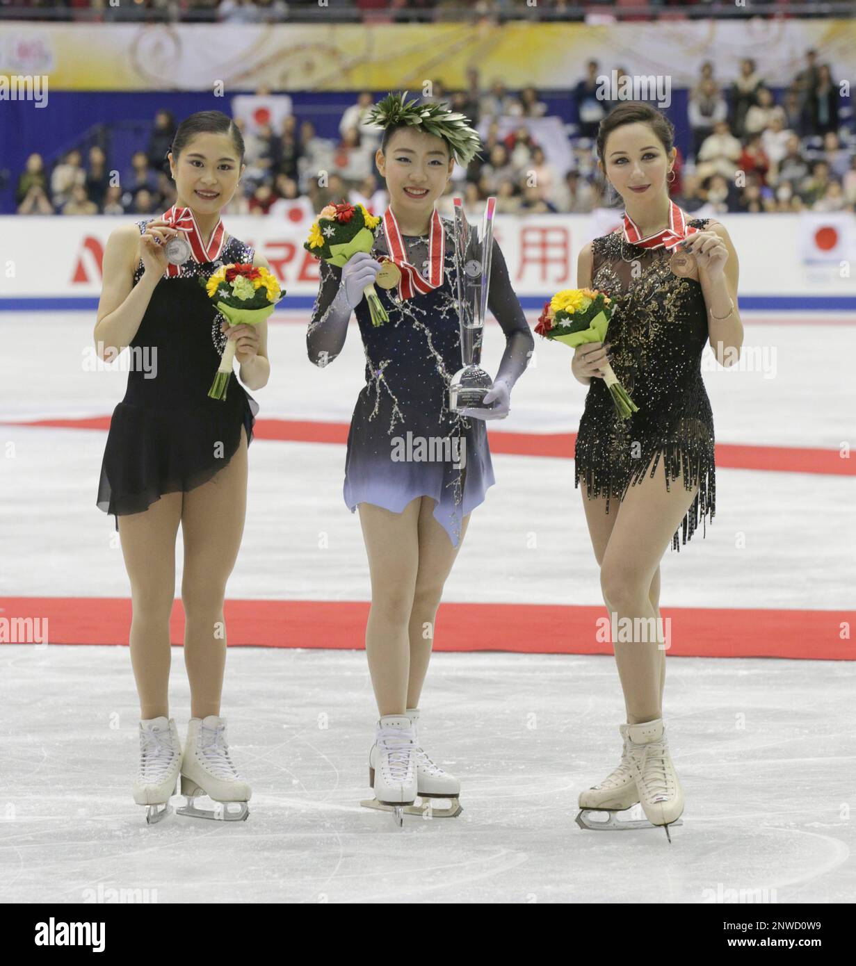 (L to R) Japan's Tomoko Miyahara, silver, Rika Kihira, Gold, and Russia's Elizaveta TUKTAMYSHEVA ...