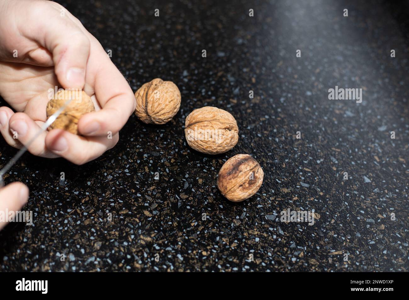 Peeling a walnut hi-res stock photography and images - Alamy