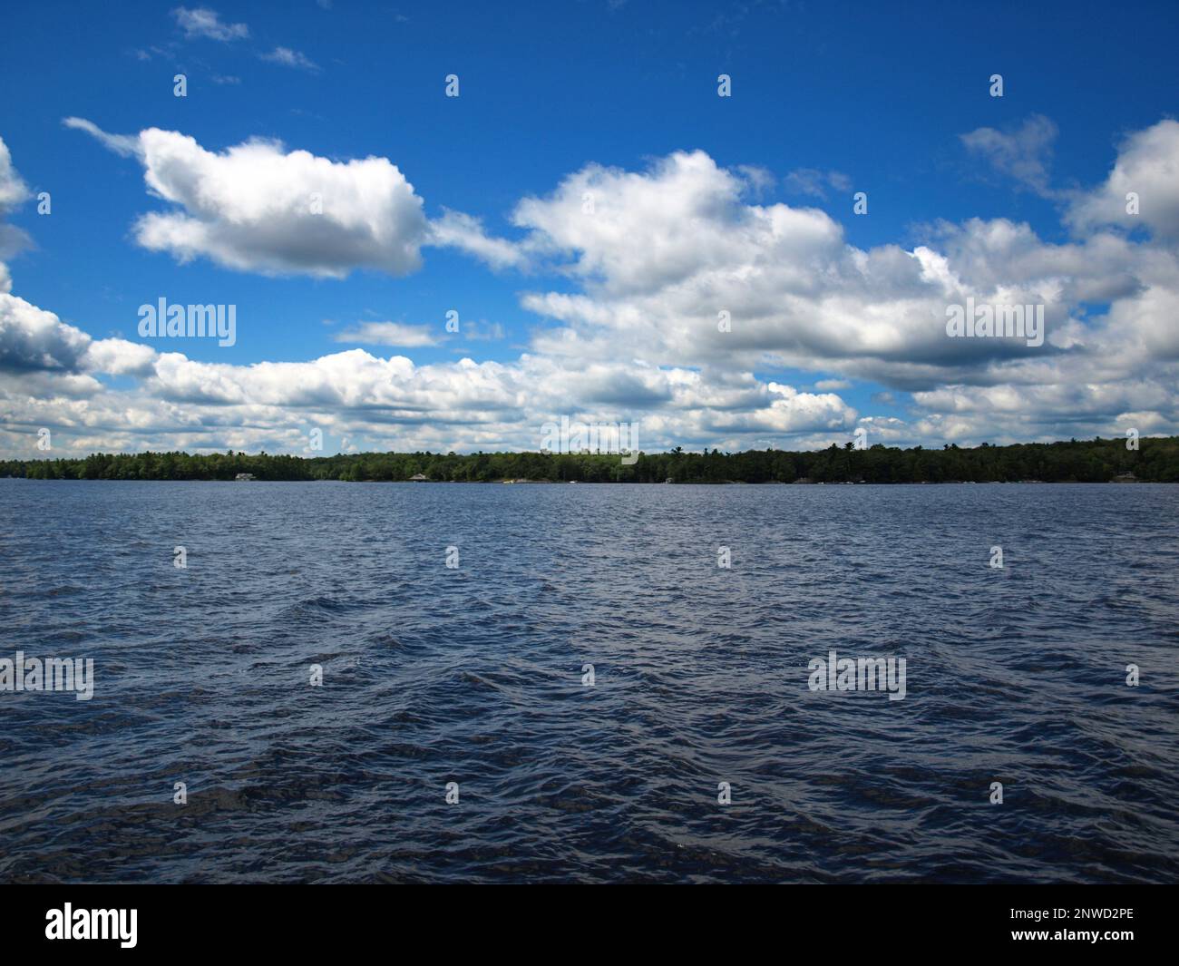Huge lake with only water, sky and clouds - Muskoka, ON, Canada Stock ...