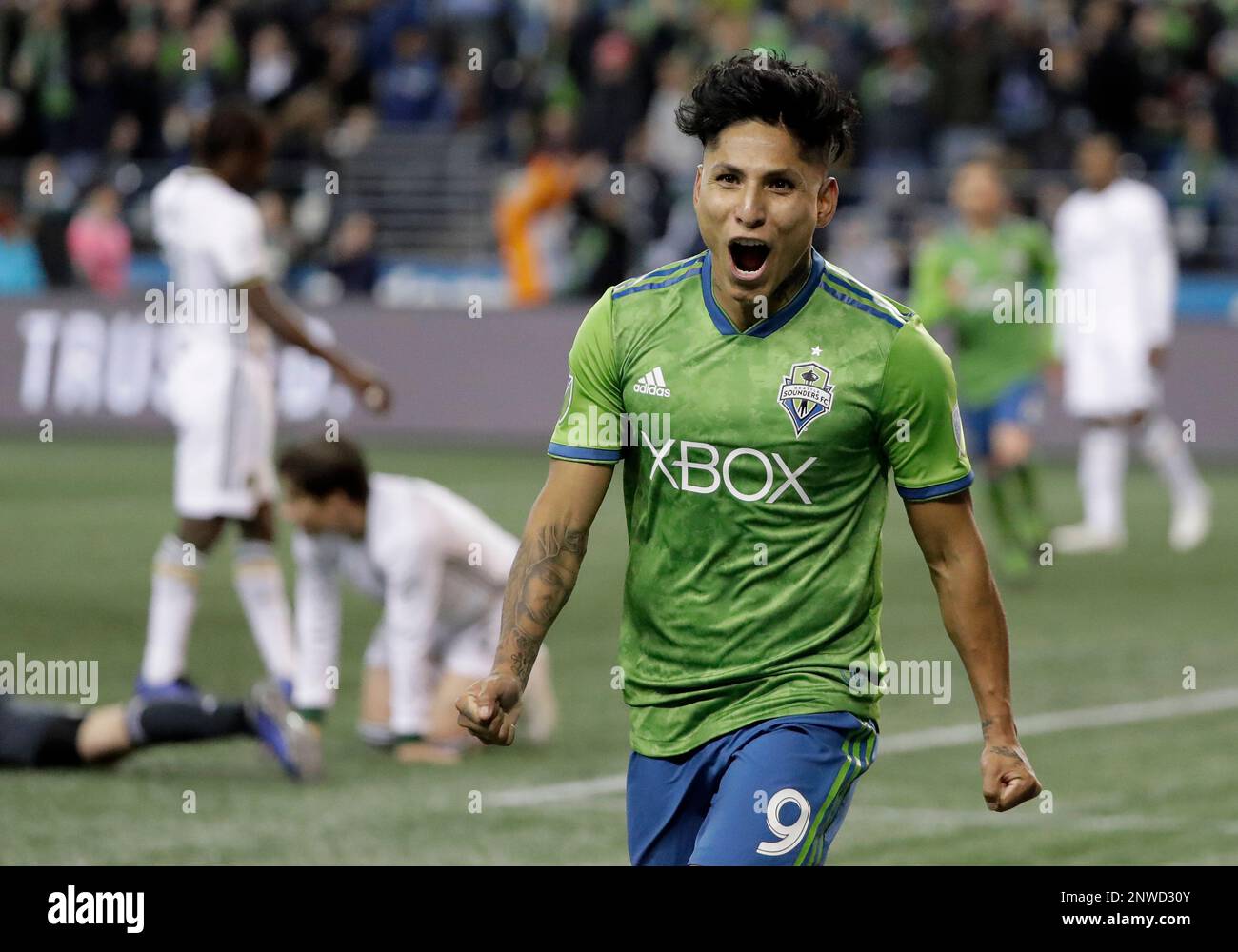 Seattle Sounders forward Raul Ruidiaz celebrates after he scored a goal ...