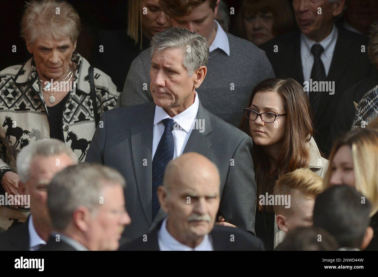 Tony Hulman George, center, walks out of St. Benedict Church with ...