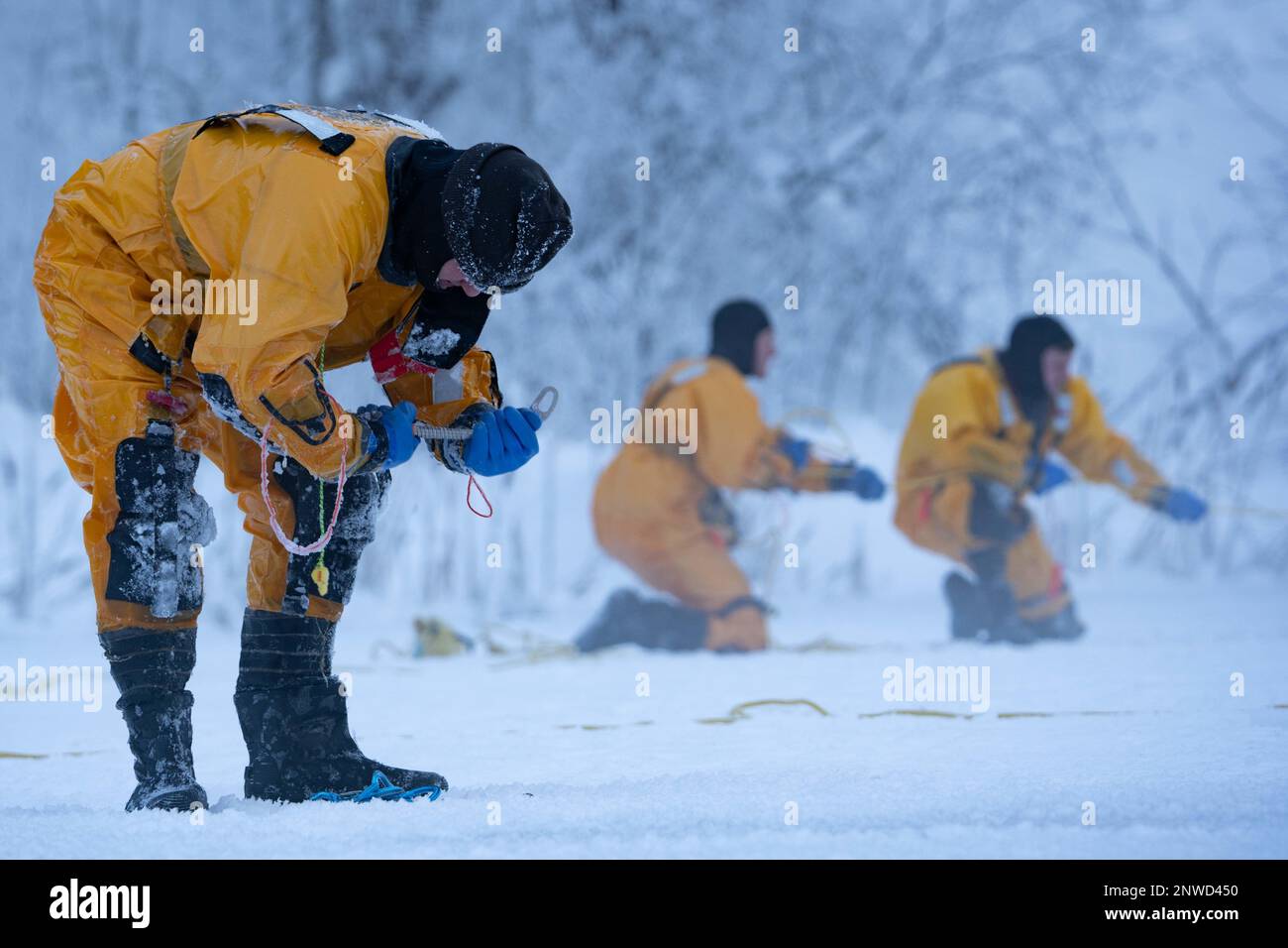 Karl Schultz, left, a firefighter for the 673d Civil Engineer Squadron ...