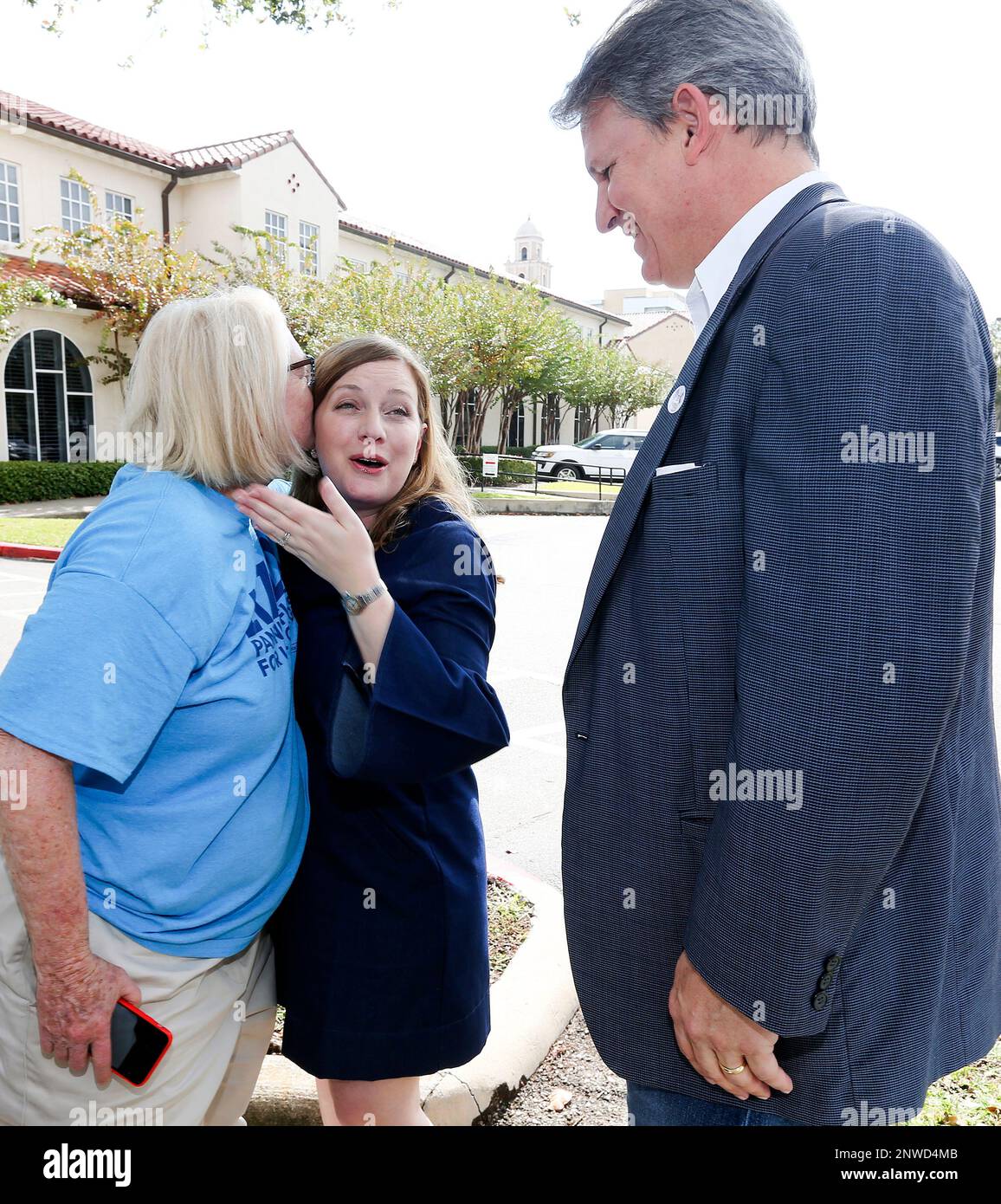 Lizzie Pannill Fletcher gets a kiss from her mom, Deborah Detering, as ...