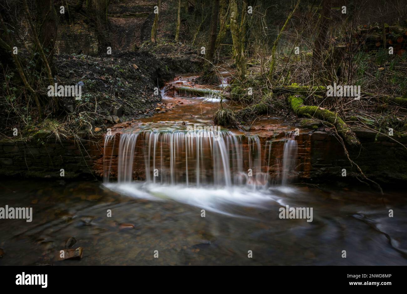 A stream through a redundant old works joining the Lower Clydach River ...