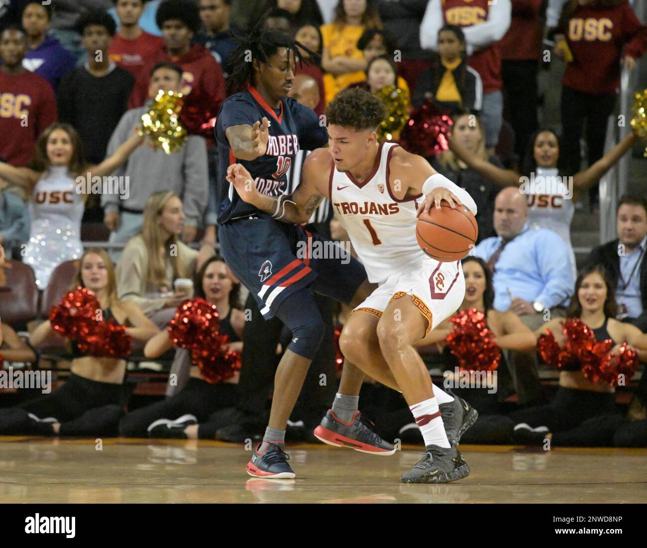 Robert Morris Colonials forward Koby Thomas (10) is defended by Robert ...