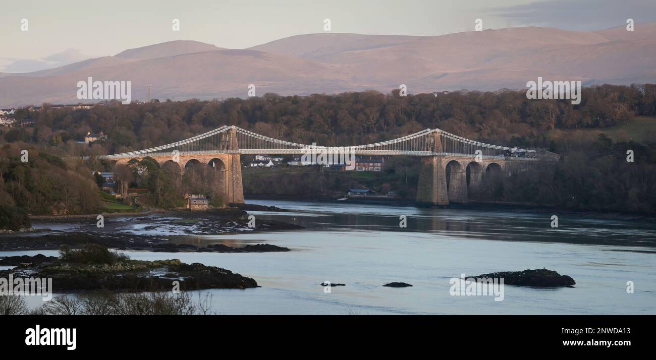 The Menai Suspension Bridge spanning the Menai Straits that separate ...