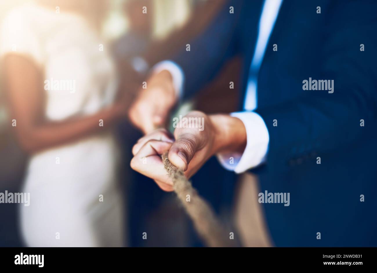 Stay strong and never give up. Cropped shot of corporate businesspeople ...