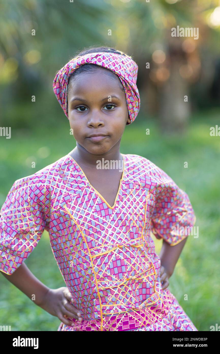Black girl standing proud Stock Photo - Alamy