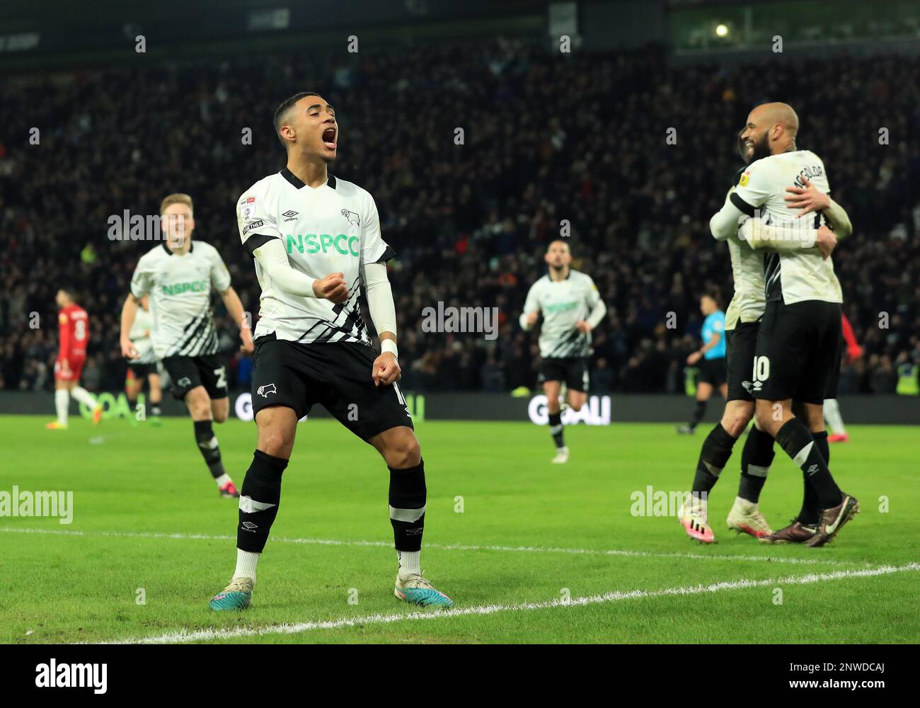 Derby County's Lewis Dobbin (centre) celebrates scoring their side's ...