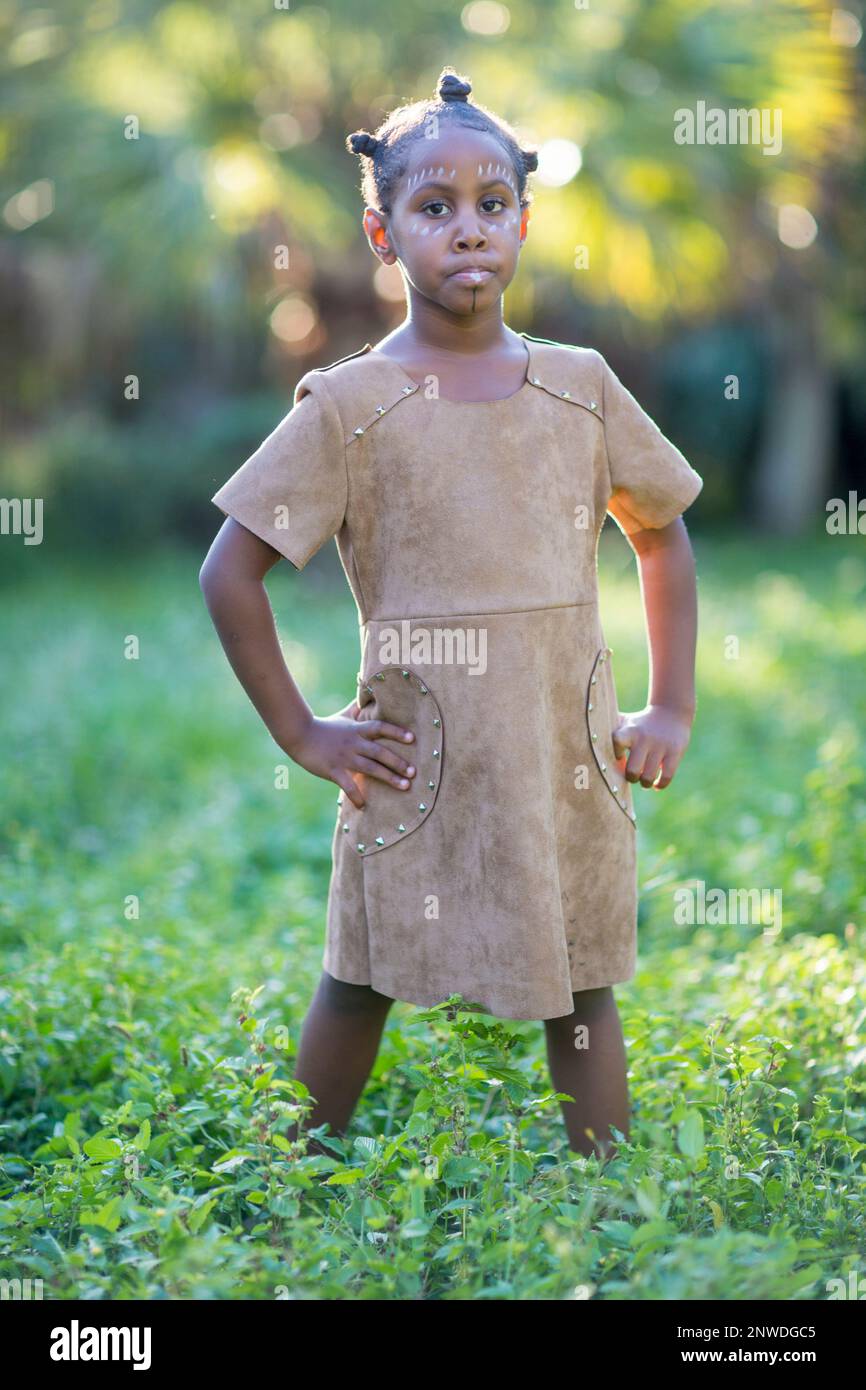 Black girl standing proud Stock Photo - Alamy