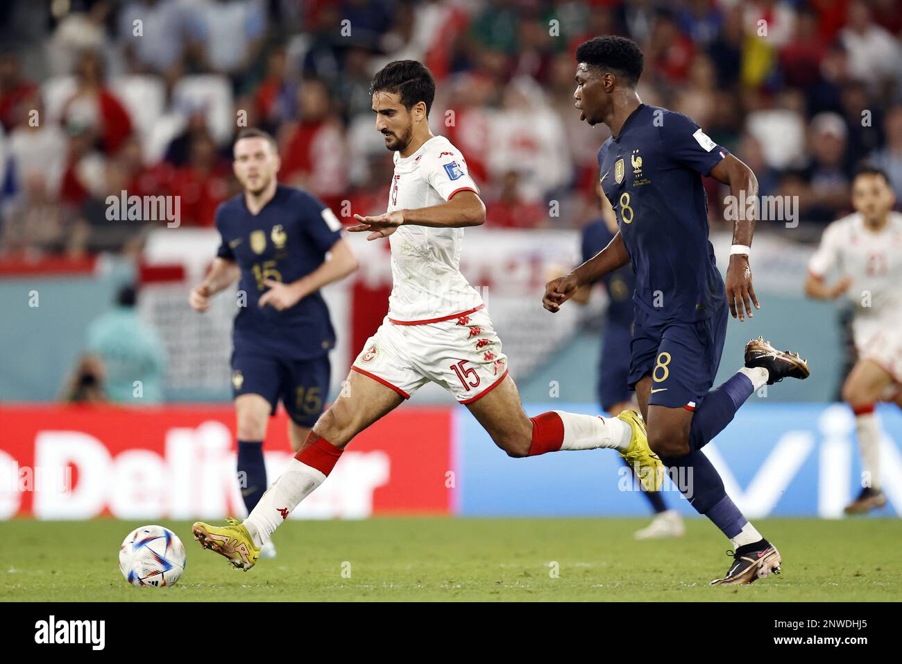 DOHA - (LR) Mohamed Ali Ben Romdhane of Tunisia, Aurelien Tchouameni of ...