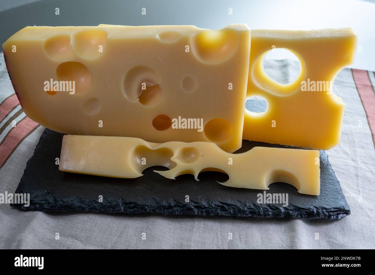 Swiss cheese collection, yellow emmentaler or emmental cheese with ...