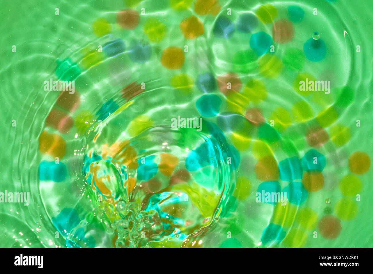 green water ripple with colorful balls, creative vivid art design Stock ...