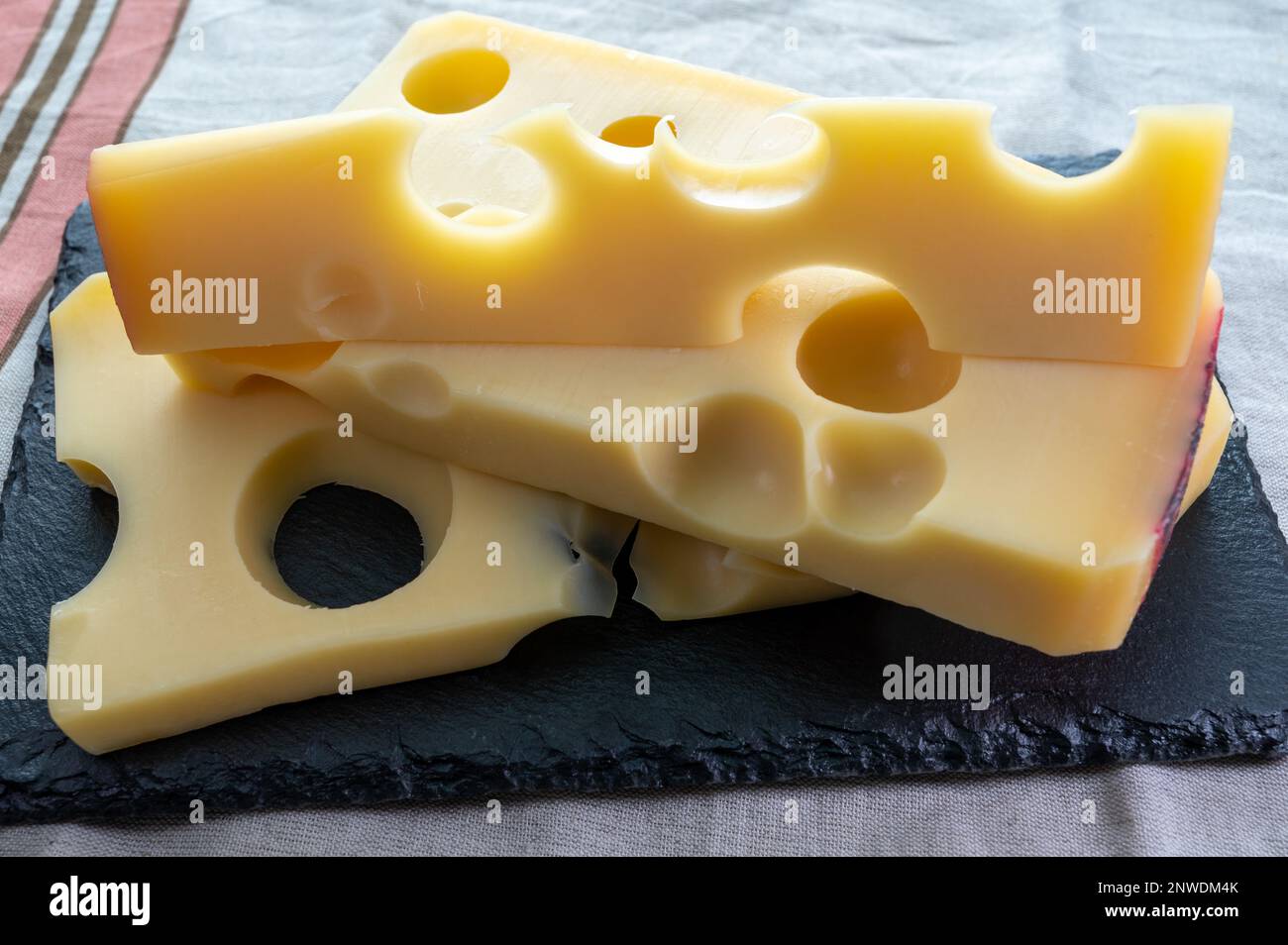 Swiss cheese collection, yellow emmentaler or emmental cheese with ...