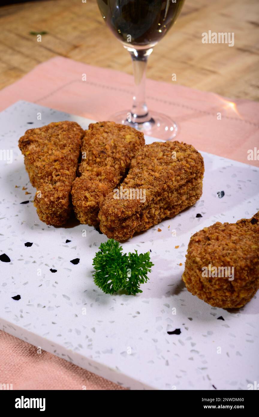 Tasty vegetarian vegan meat free chicken thighs, healthy food close up ...