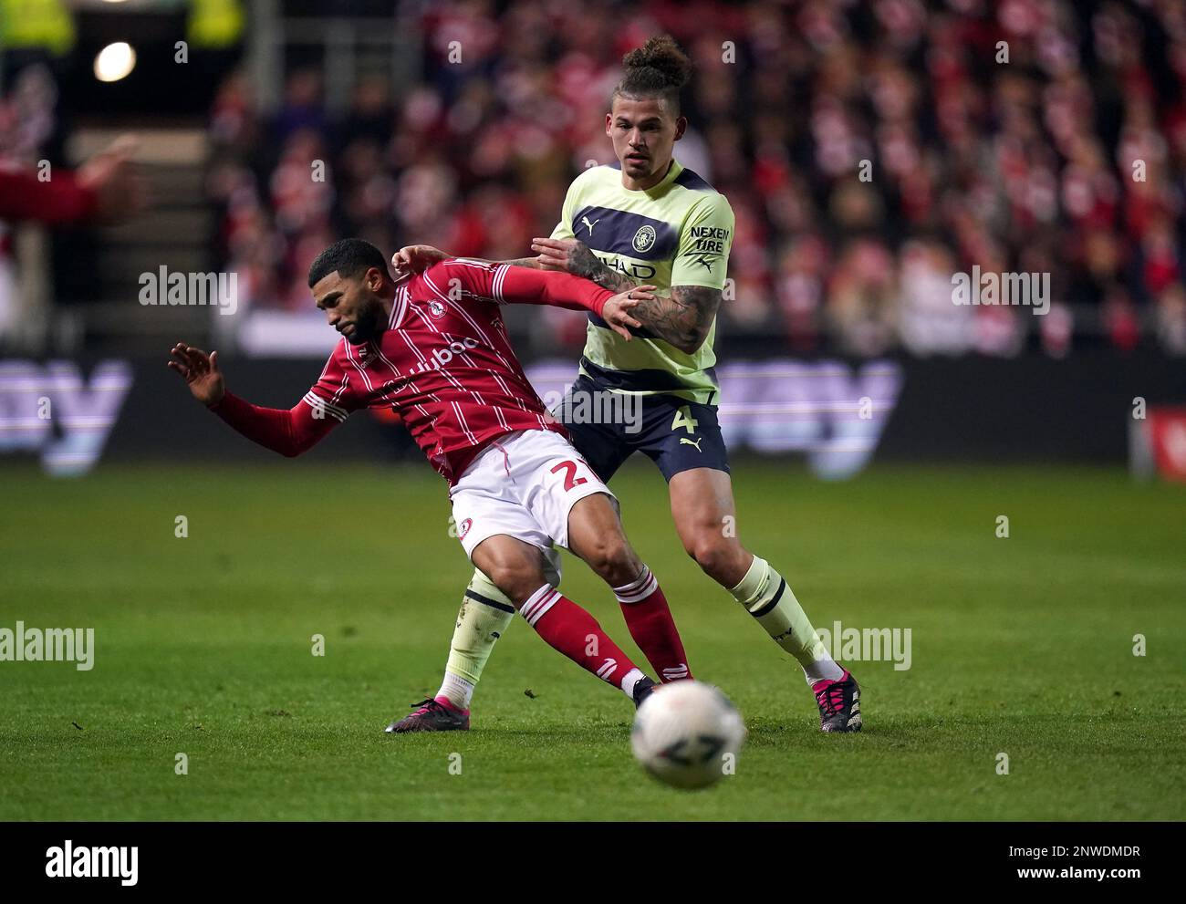 Bristol City's Nahki Wells and Manchester City's Kalvin Phillips (right ...