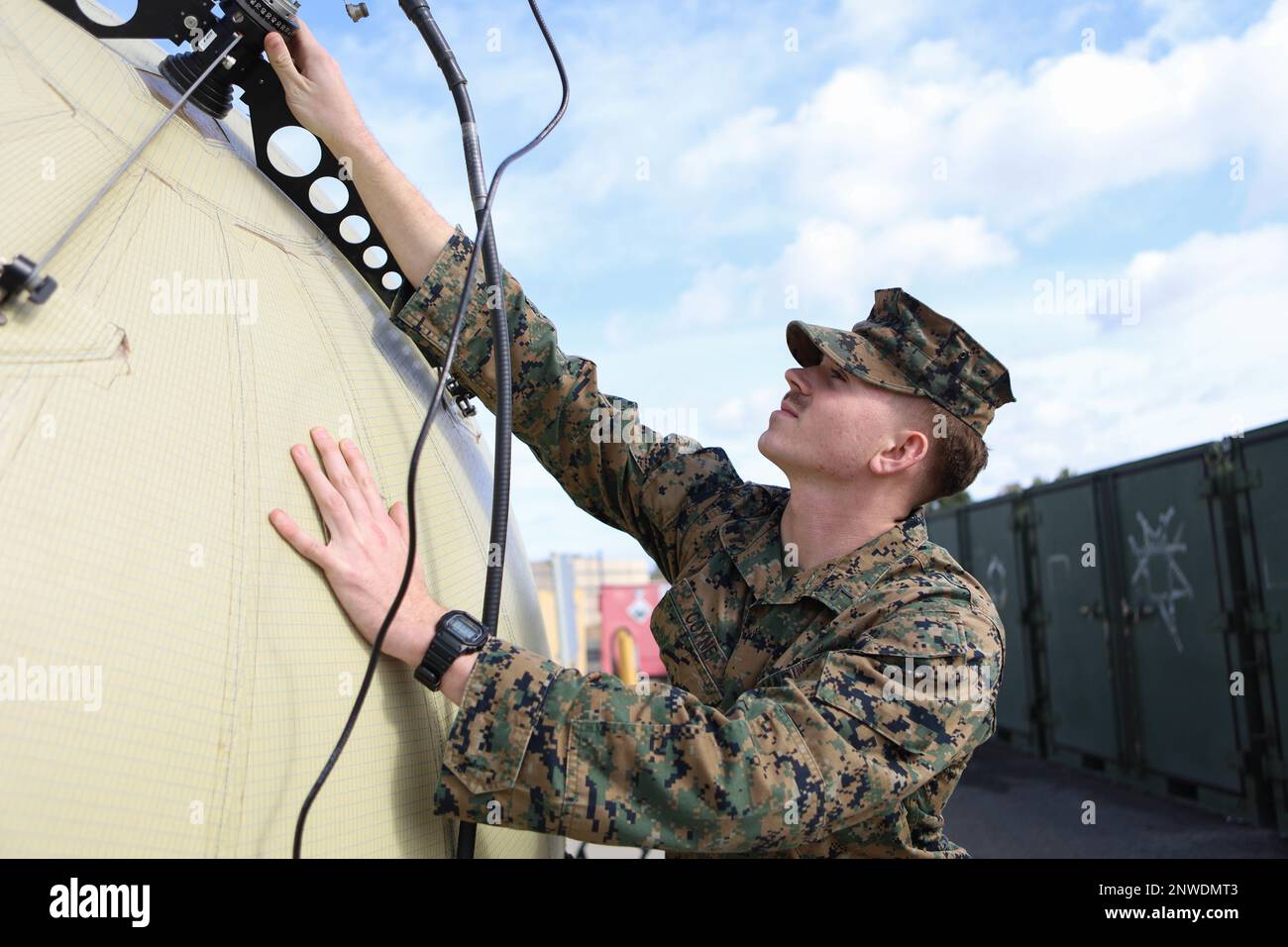 U.S. Marine Corps Lance Cpl. Tyler Coyne, a signals intelligence system ...