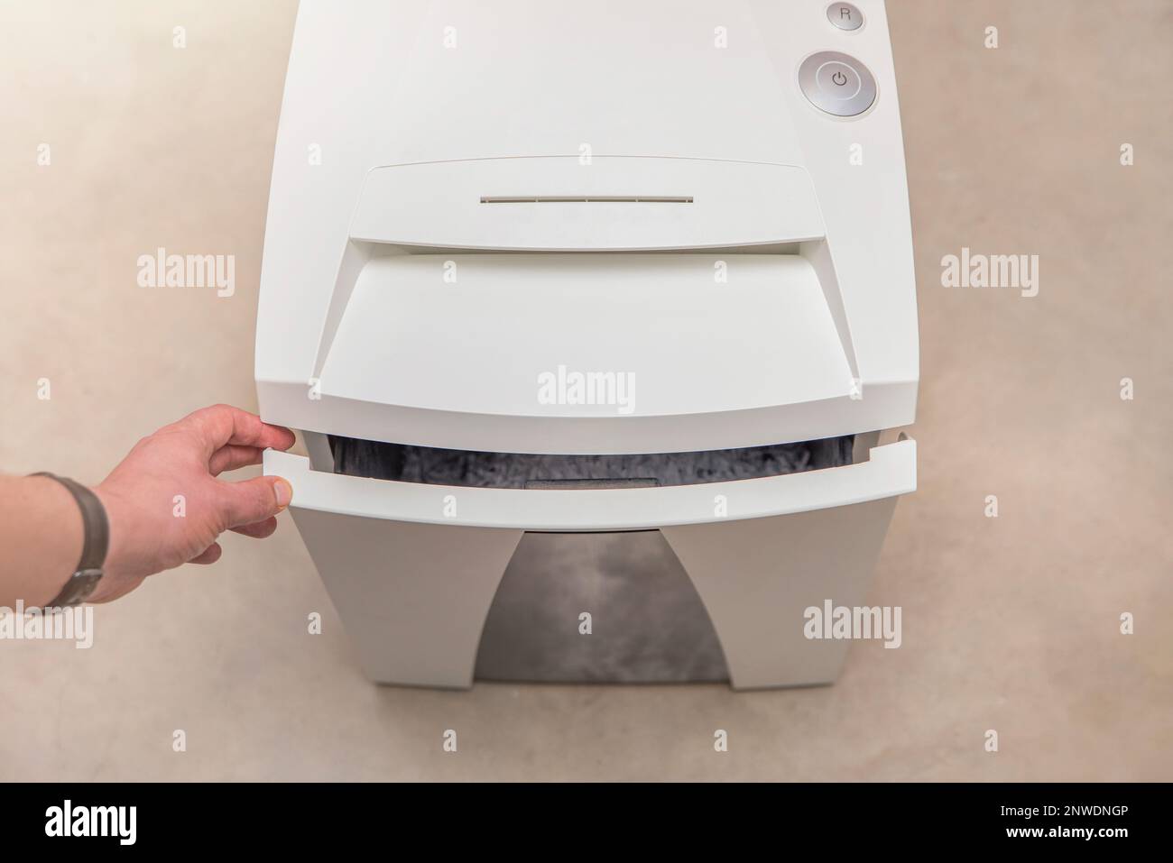 Industrial paper shredder. Paper shredder in the office, use and ...