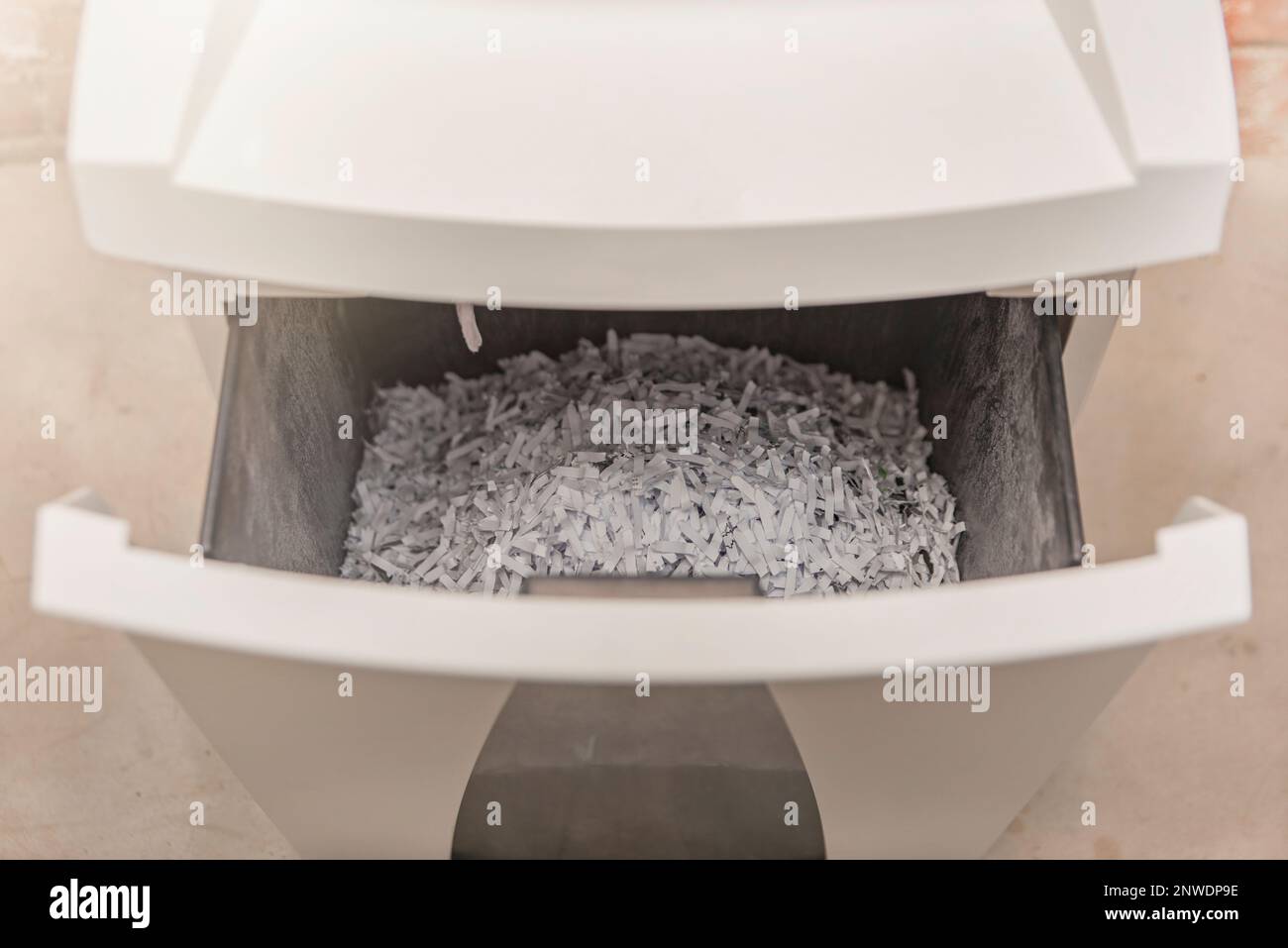 Industrial paper shredder. Paper shredder in the office, use and ...