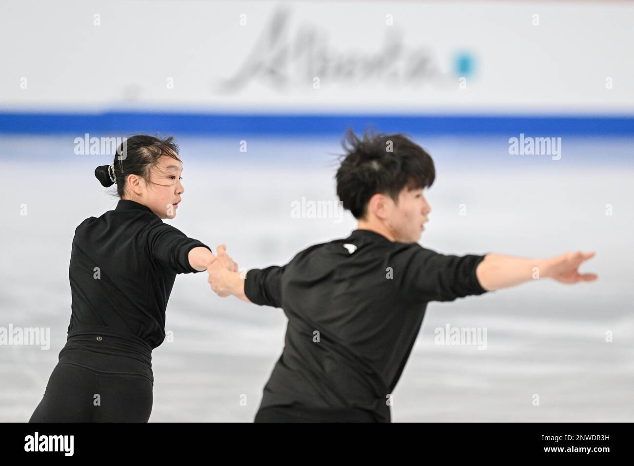 Yixi YANG & Shunyang DENG (CHN), during Pairs Practice, at the ISU ...