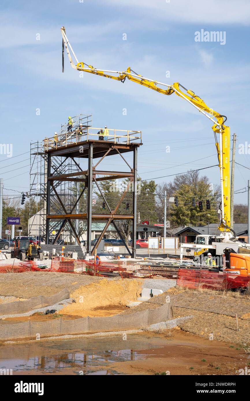 Contractors continue work on a "mock up" structure at the site of the ...