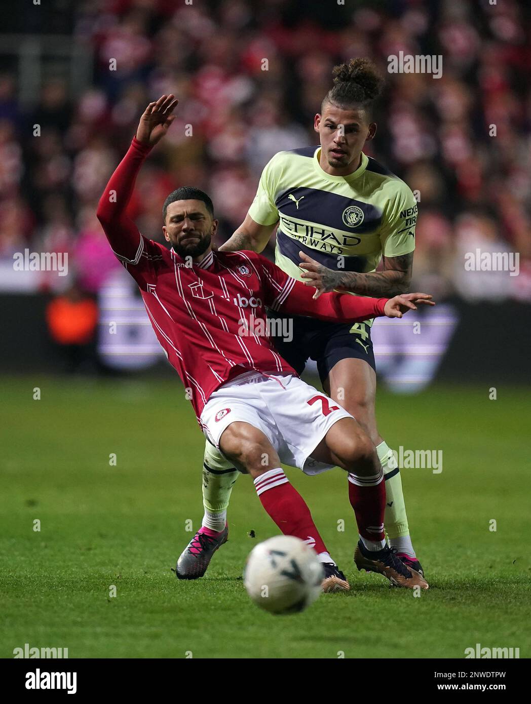 Bristol City's Nahki Wells and Manchester City's Kalvin Phillips (right ...