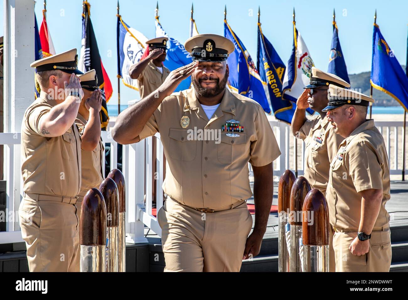 Chief Master-at-Arms George Collins, from Washington, D.C., is piped ...