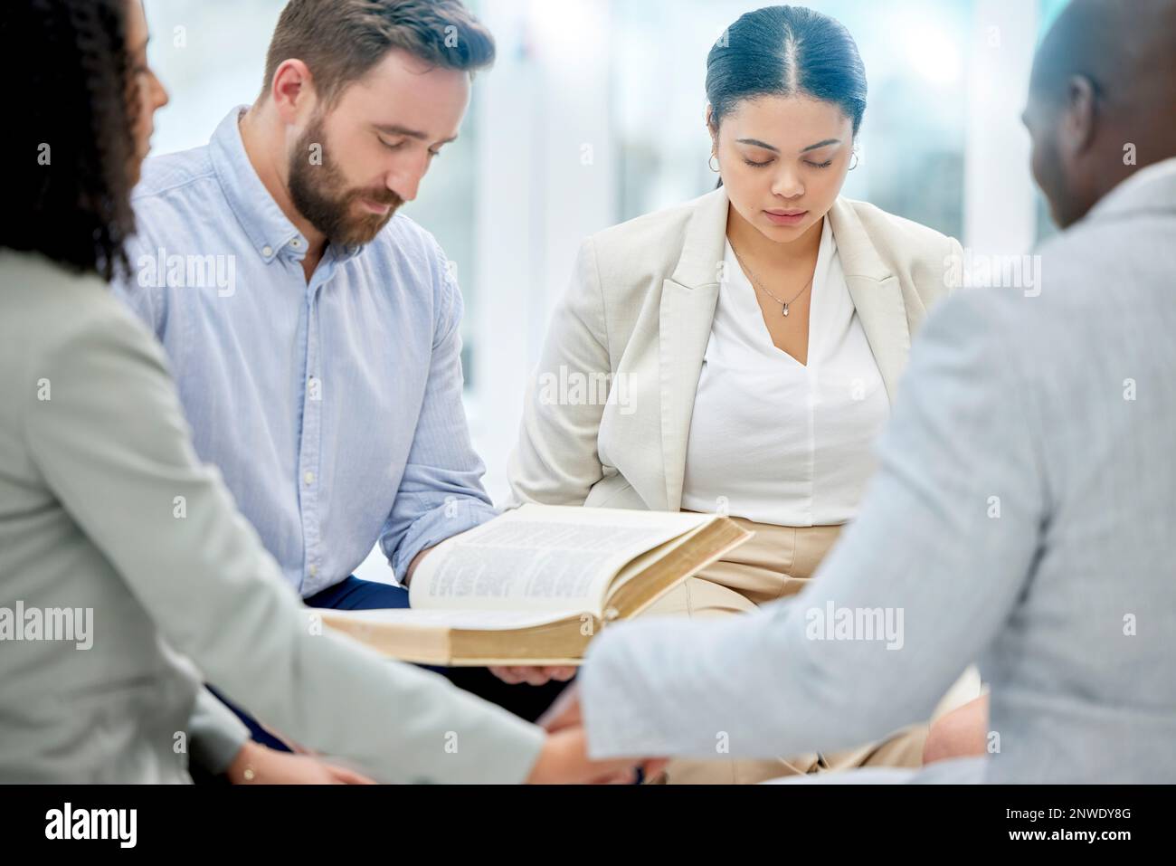 Business people, bible and office for prayer together in worship ...