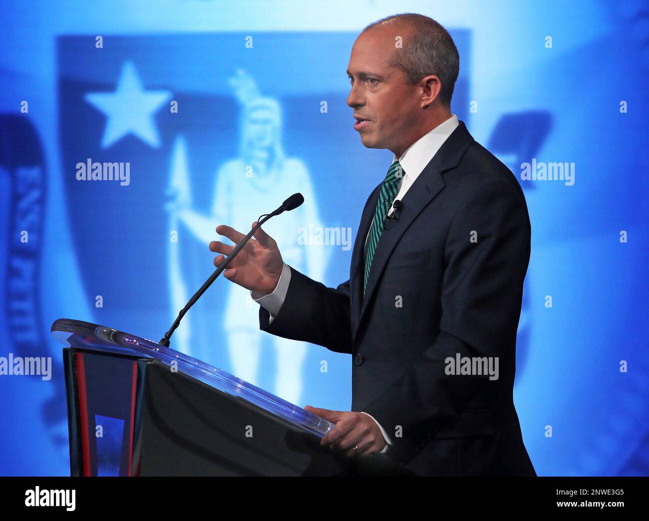 Democratic challenger Jay Gonzalez speaks during a debate with ...
